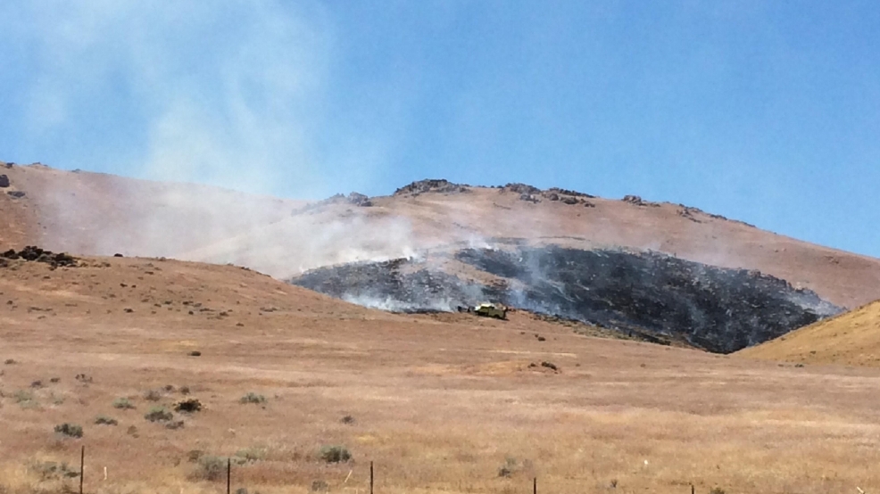 Fire officials working on brush fire on Pyramid Way in Sparks | KRNV