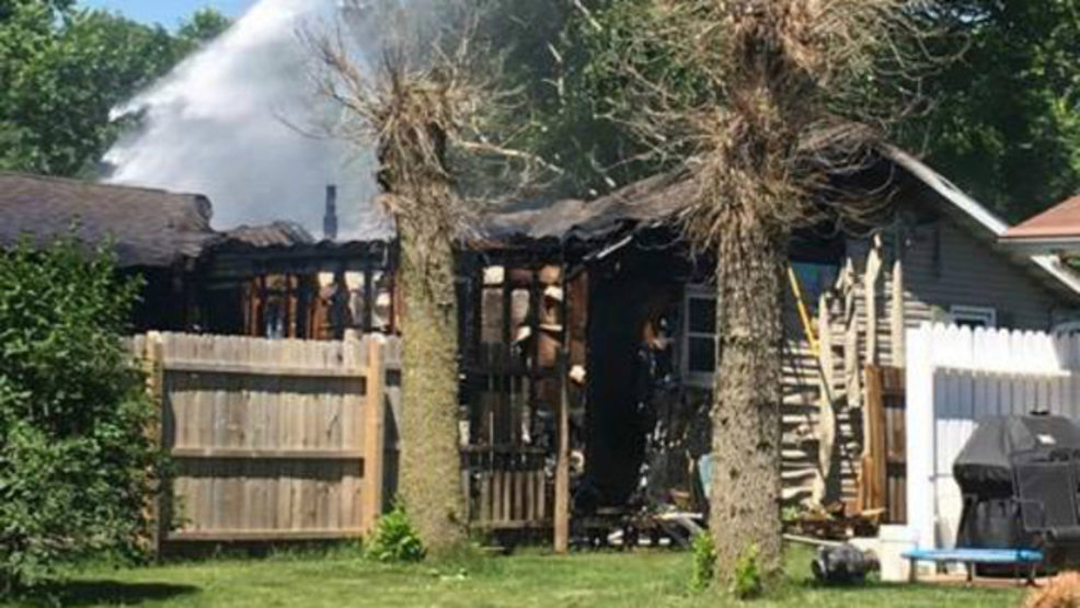 Residential porch fire spreads to roof | WMSN